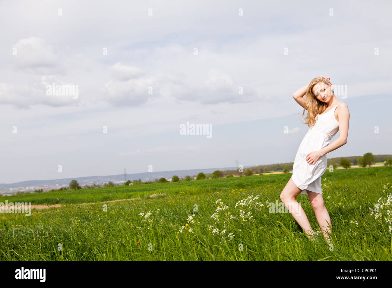 beautiful blonde woman outdoor in summer happy Stock Photo - Alamy