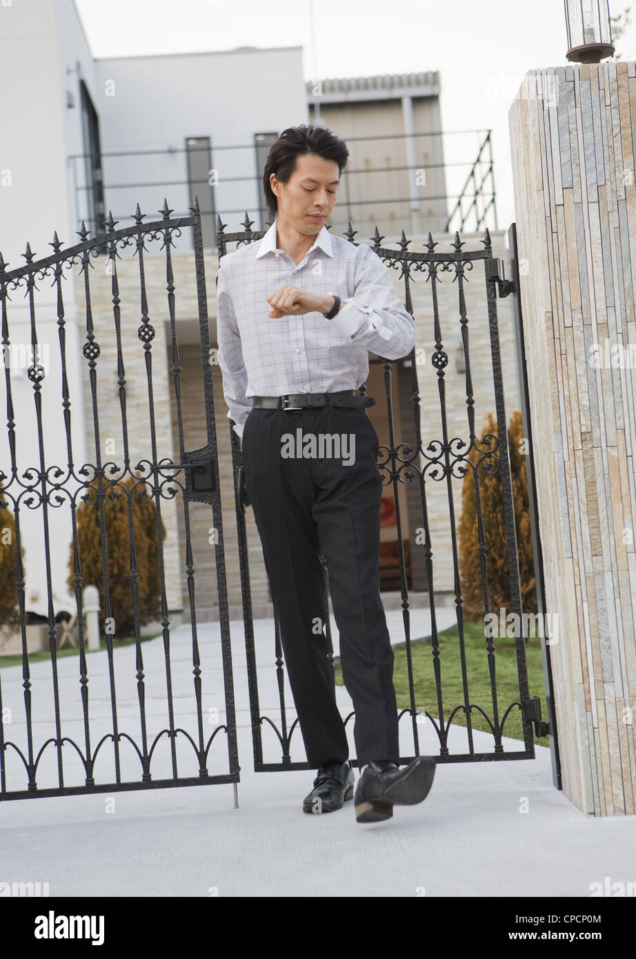 Middle-aged man going out Stock Photo - Alamy