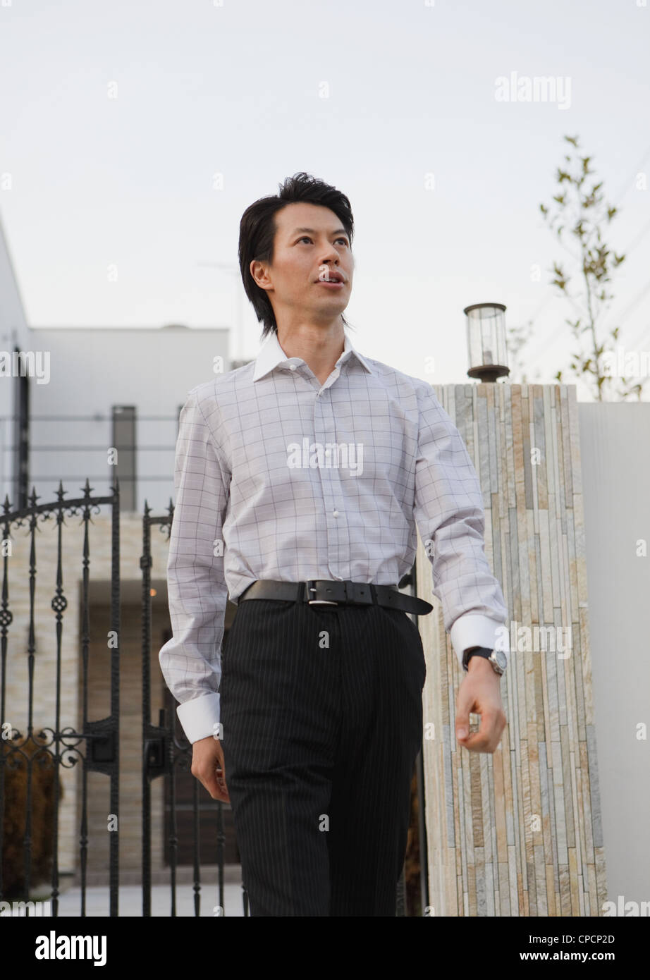 Middle-aged man going out Stock Photo - Alamy