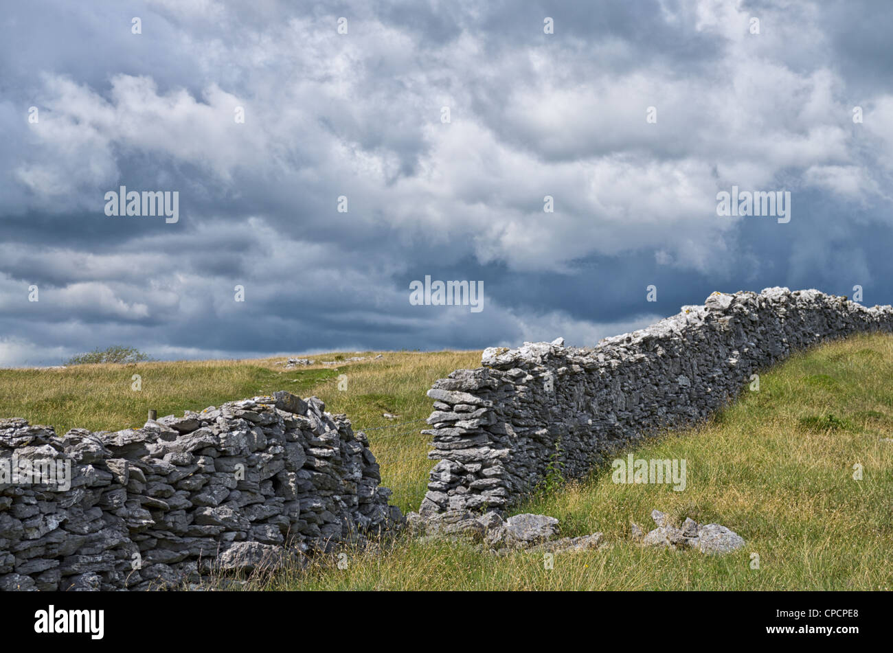 Farleton Knott Cumbria Limestone dry stone wall dramatic grey clouds ...