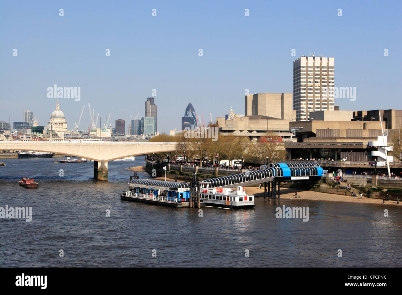 London skyline from Hungerford Bridge. Festival Pier, Waterloo Bridge ...