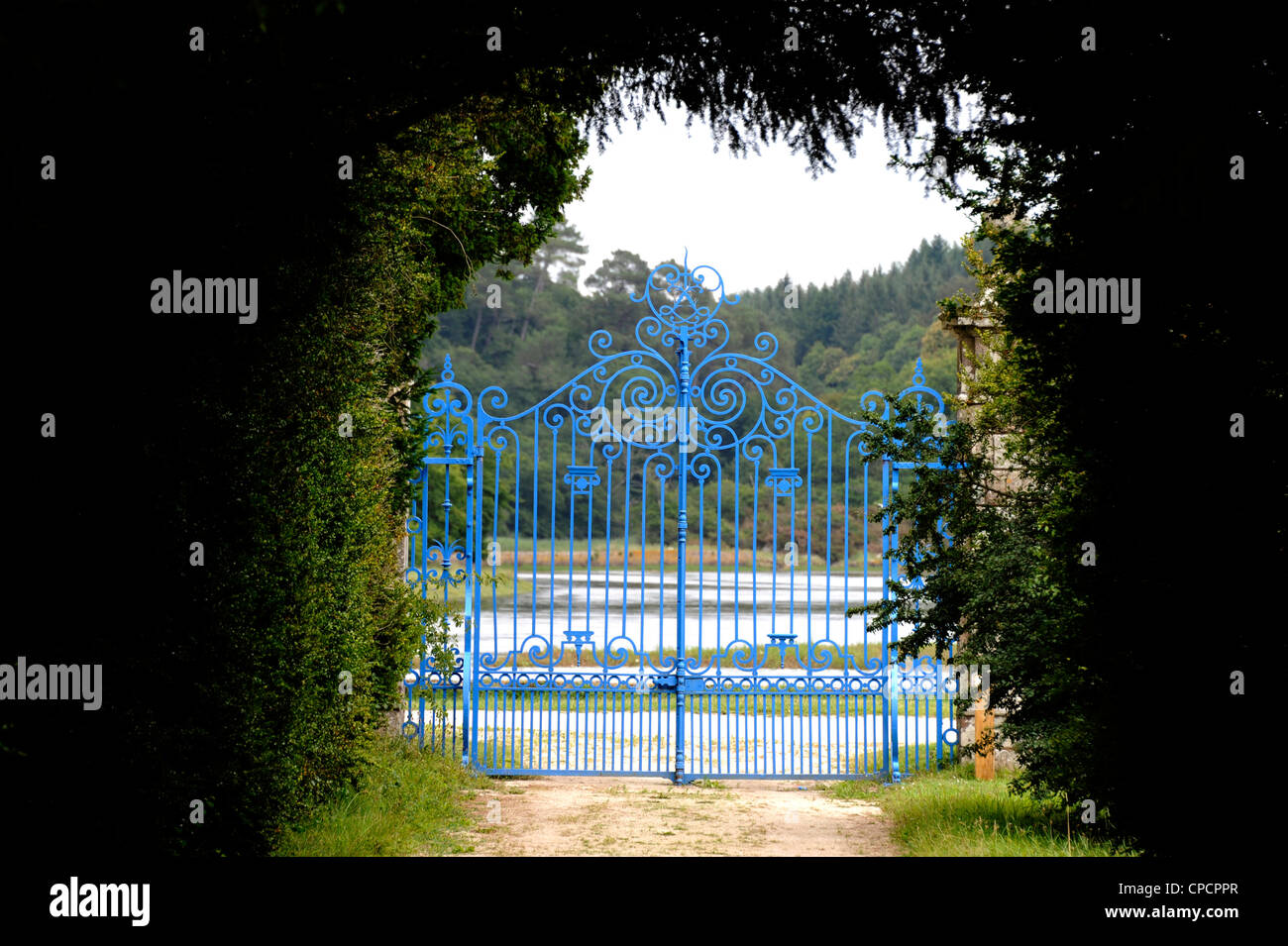 Blue gate at site abbatial de saint maurice hi-res stock photography ...