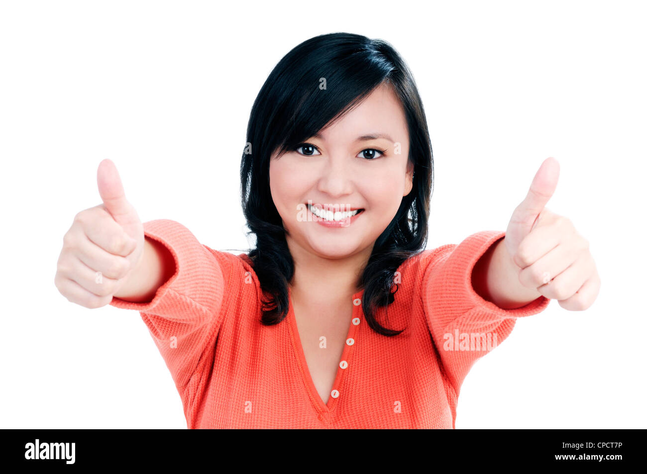 Smiling woman giving two thumbs up gesture Stock Photo - Alamy