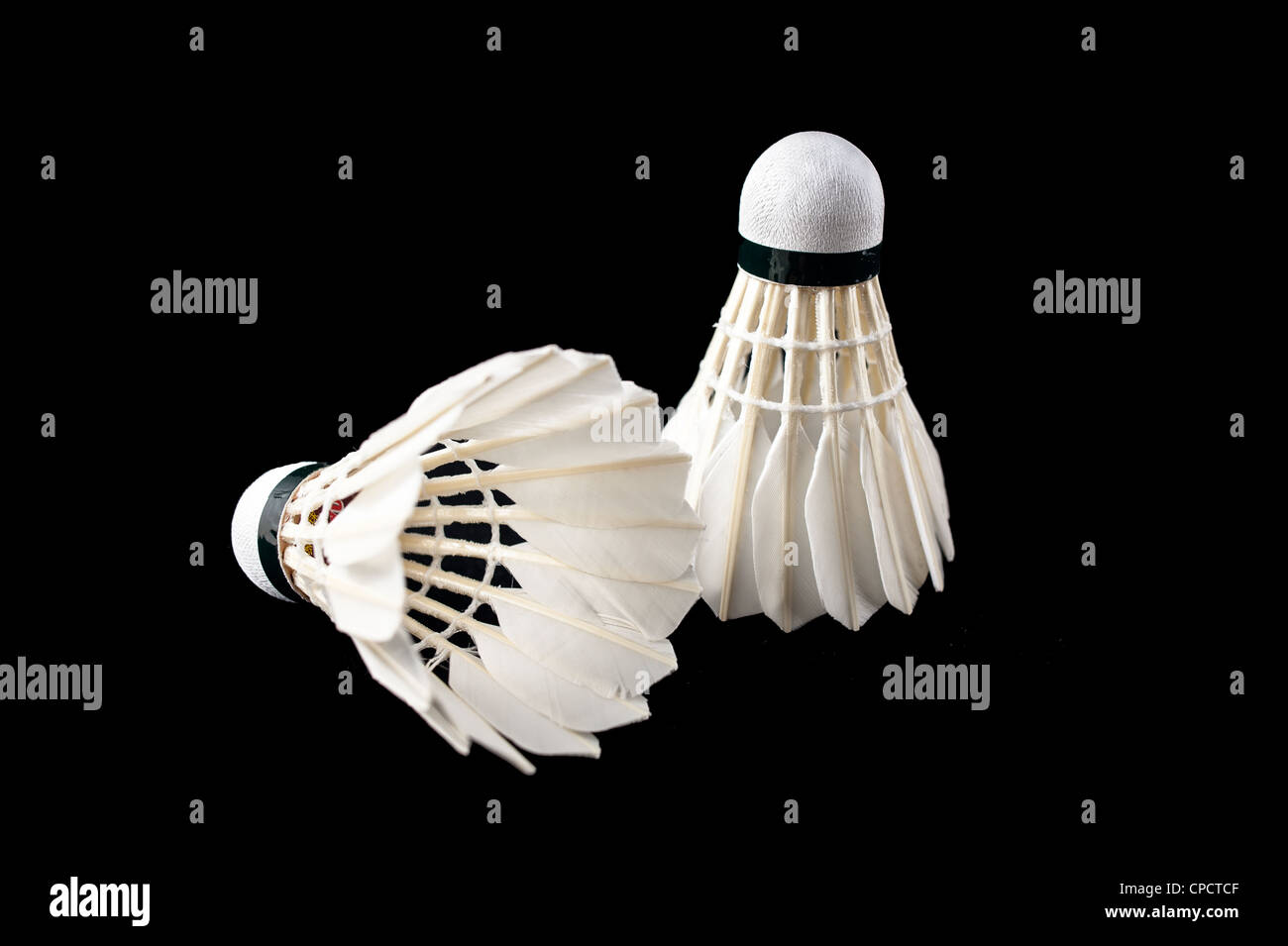 Two shuttlecock balls on the black background Stock Photo - Alamy