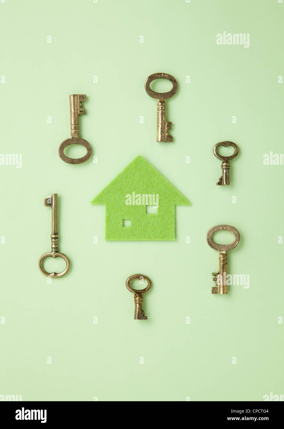 Eco house and keys Stock Photo - Alamy