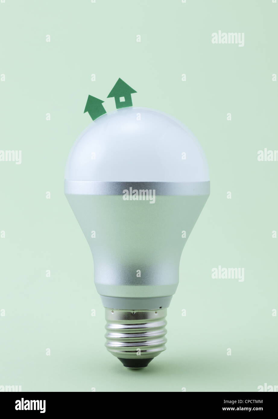 LED bulb and miniature houses Stock Photo - Alamy