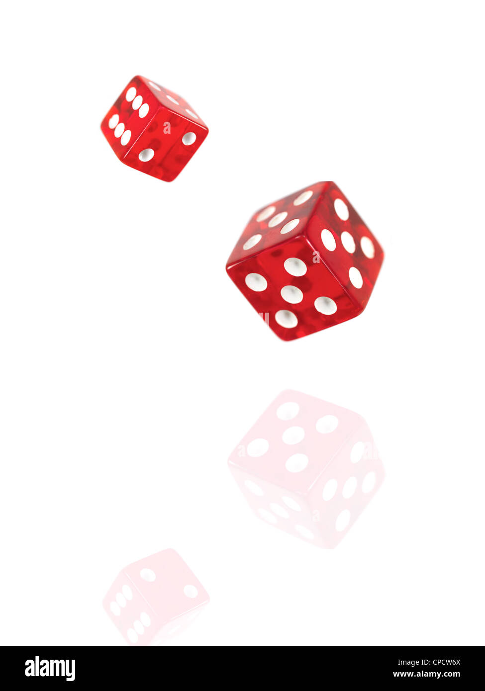 Red die isolated against a white background Stock Photo - Alamy