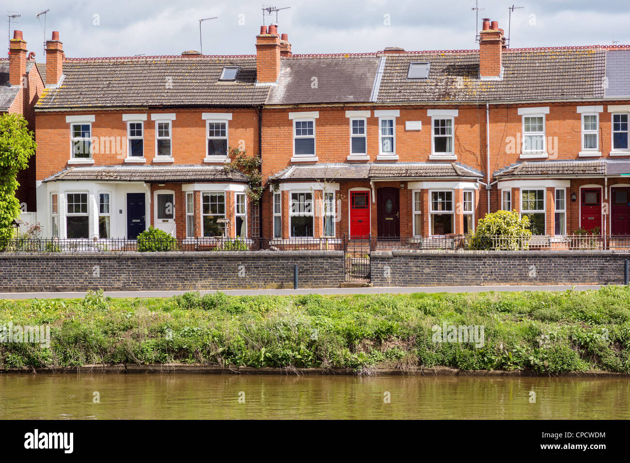 river with houses on a bank Stock Photo - Alamy