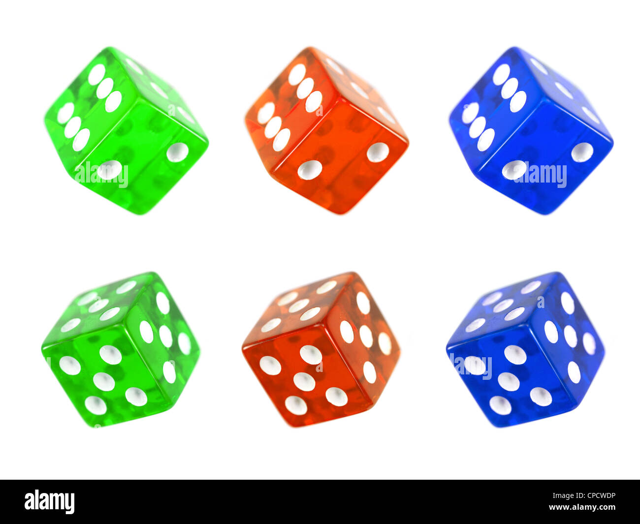 Colored die isolated against a white background Stock Photo - Alamy