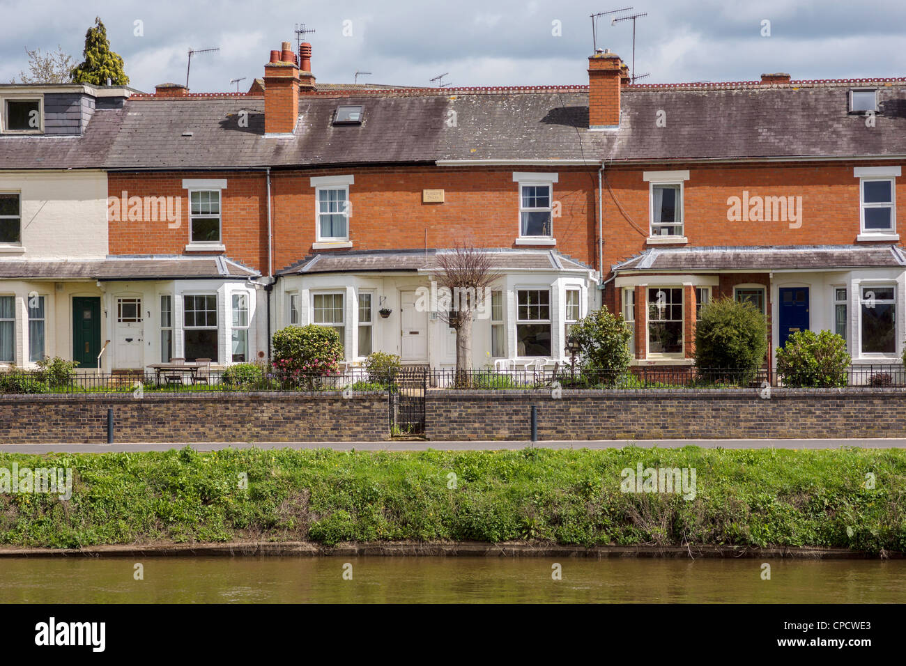 river with houses on a bank Stock Photo - Alamy