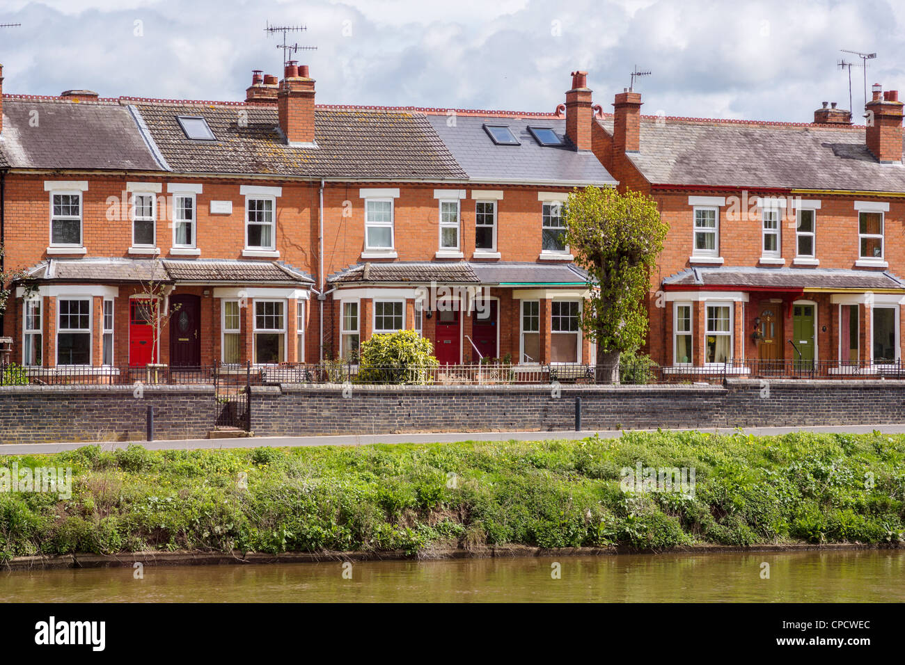 river with houses on a bank Stock Photo - Alamy