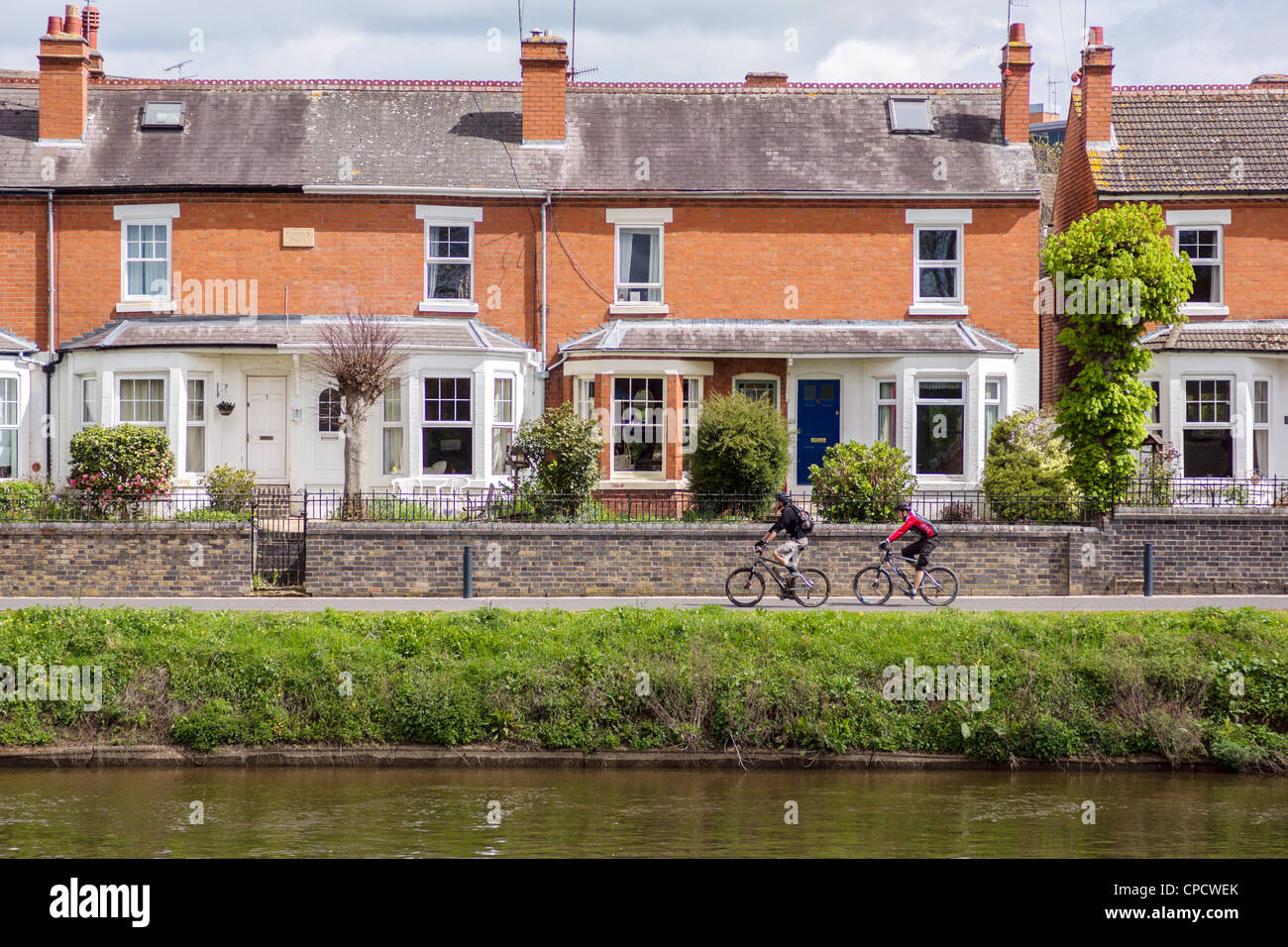 river with houses on a bank Stock Photo - Alamy