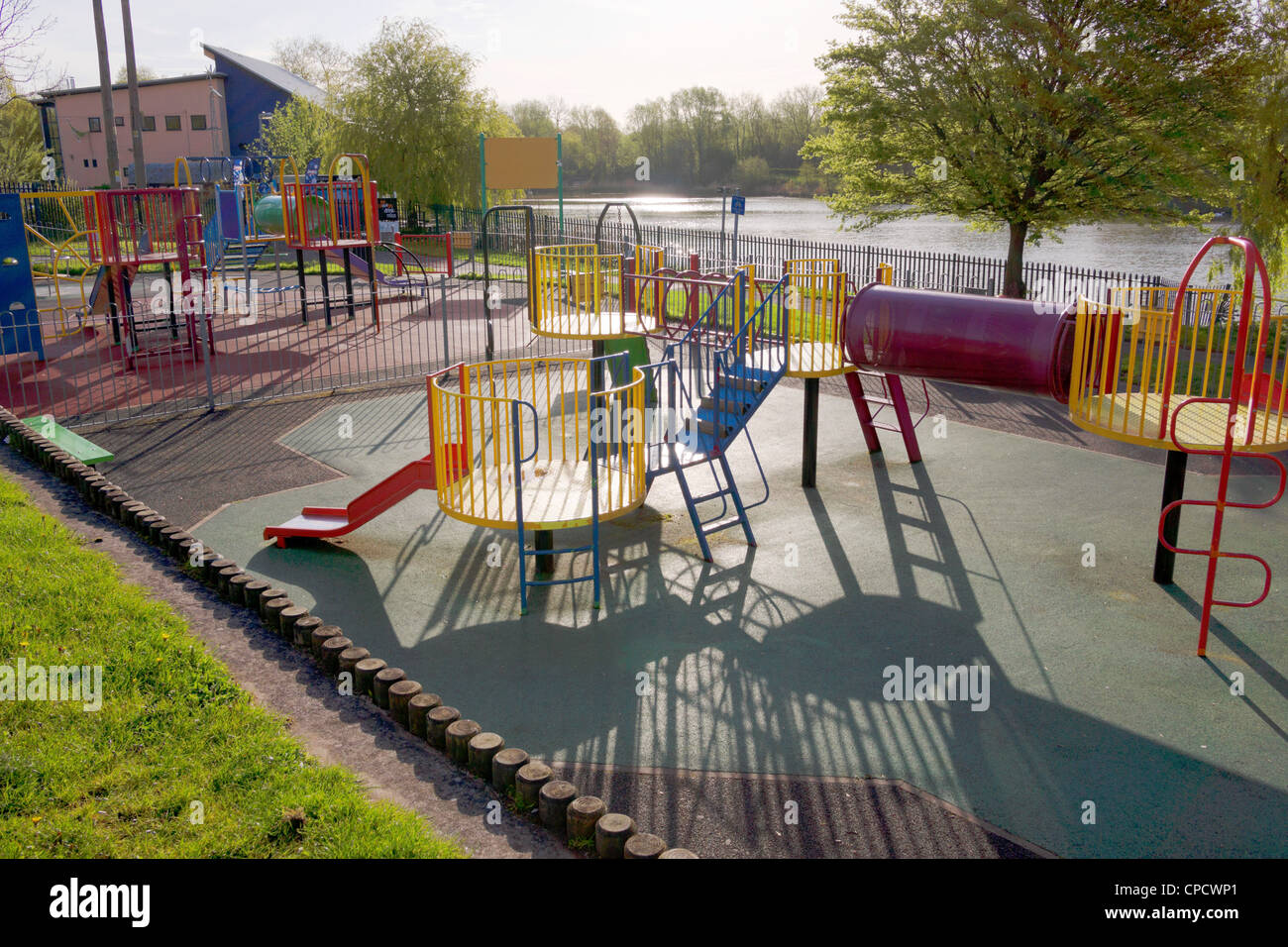 Park with playground and field and pond hi-res stock photography and ...