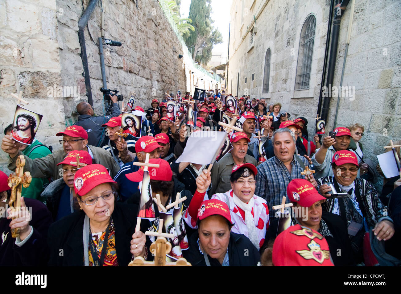 Coptic Egyptian pilgrims walking in a procession through the Via ...