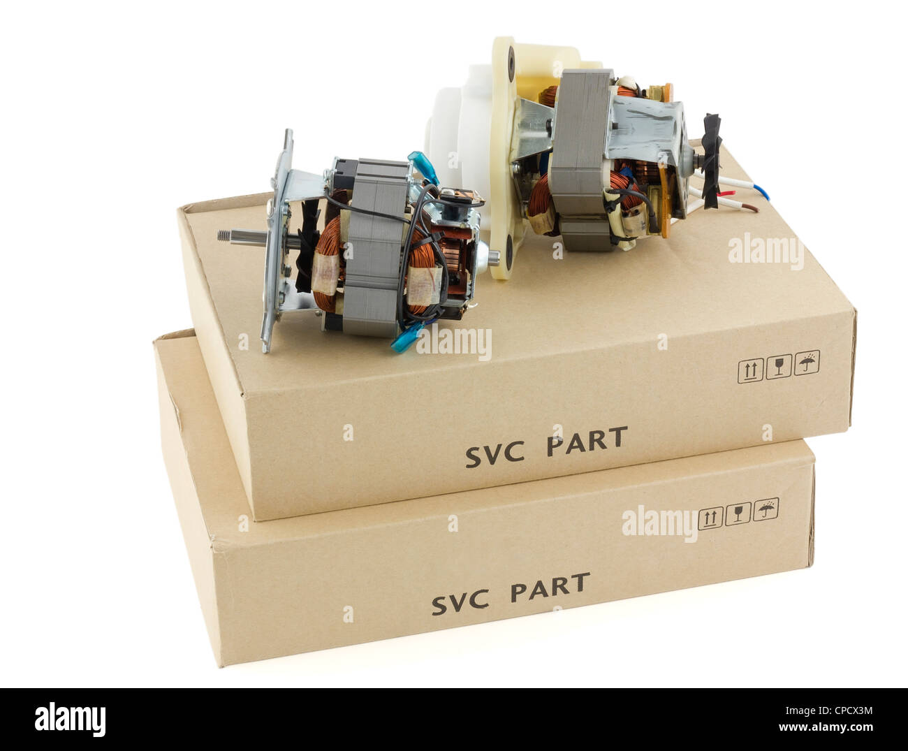Electric motors as spare parts and cardboard boxes with industry ...