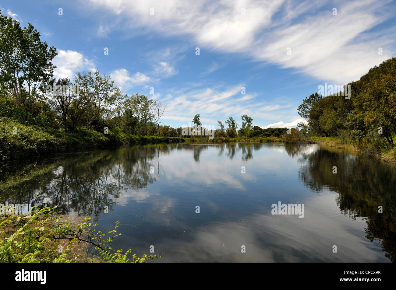 Beautiful lagoon landscape with a cloudy sky Stock Photo - Alamy
