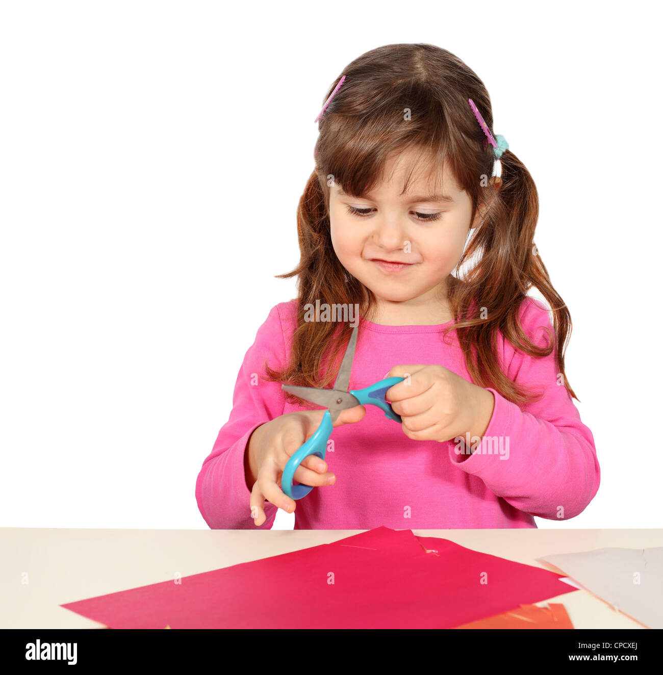 Little Cute Girl Cutting with Scissors over White Stock Photo - Alamy