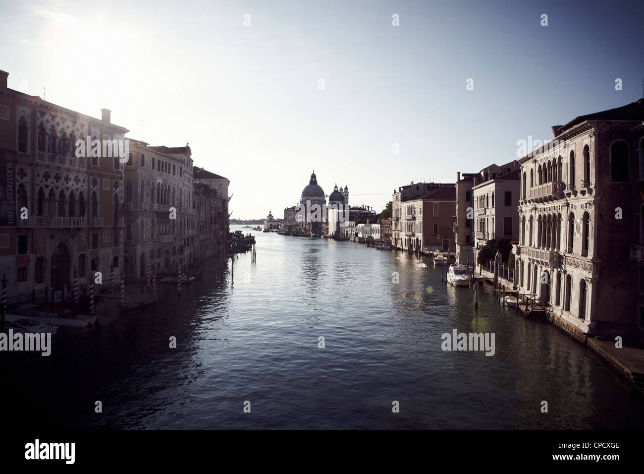 Buildings and piers on urban canal Stock Photo - Alamy