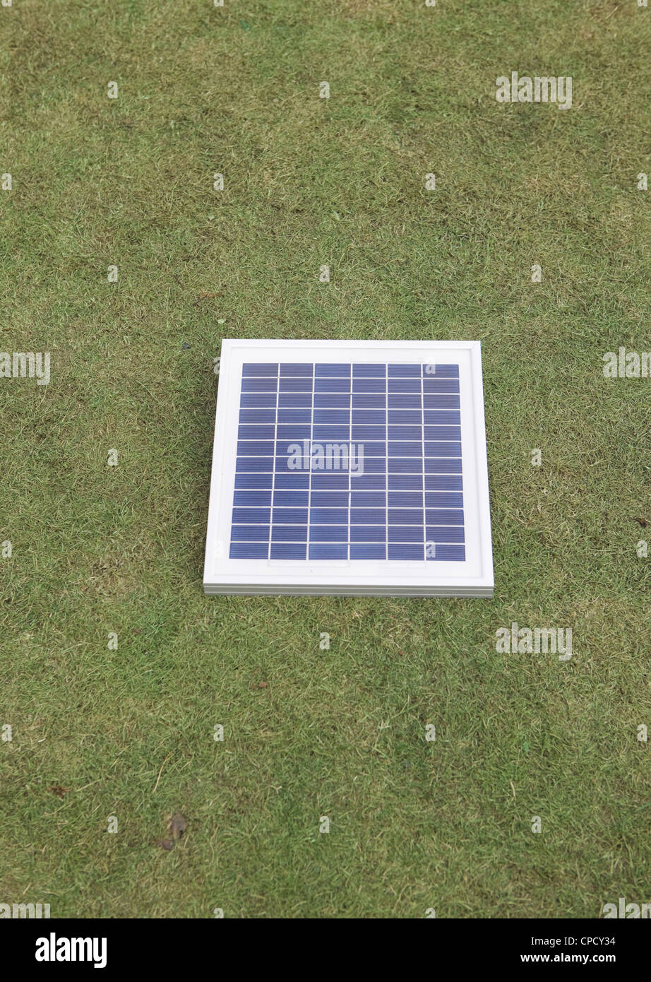 Solar panel on a grass field Stock Photo - Alamy
