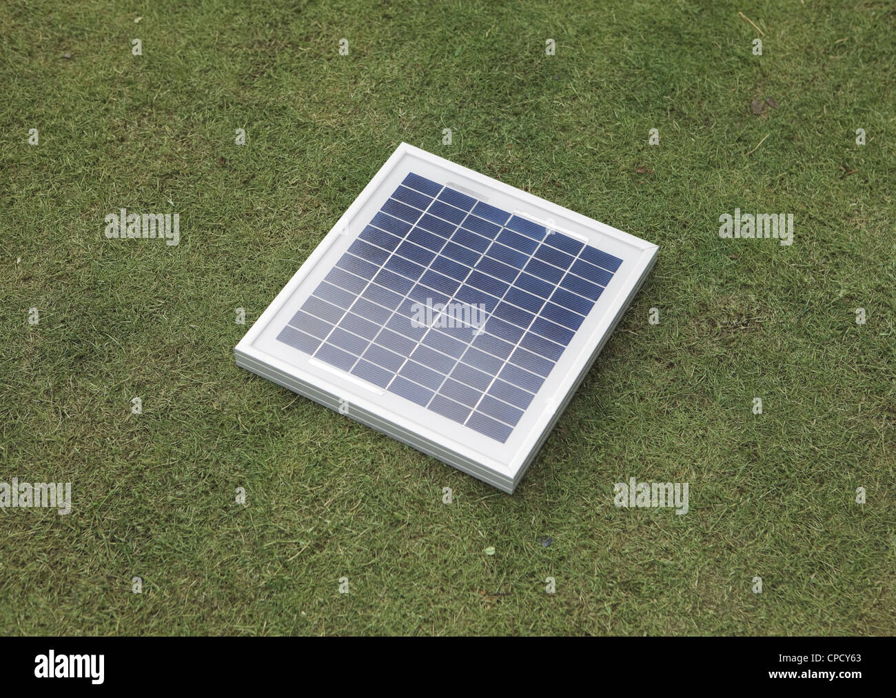 Solar panel on a grass field Stock Photo - Alamy