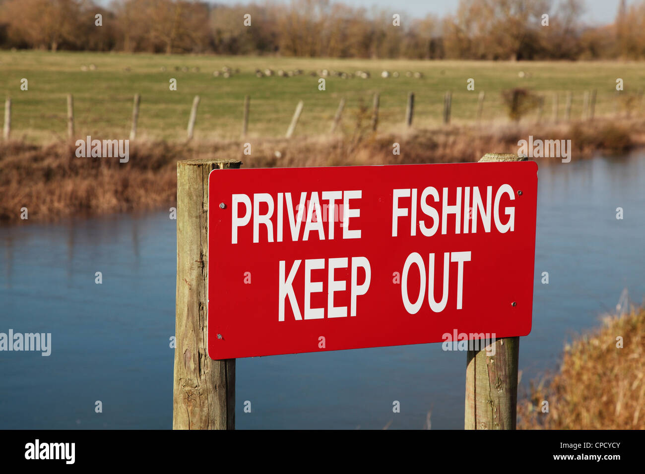 A Private Fishing sign next to a river Stock Photo - Alamy