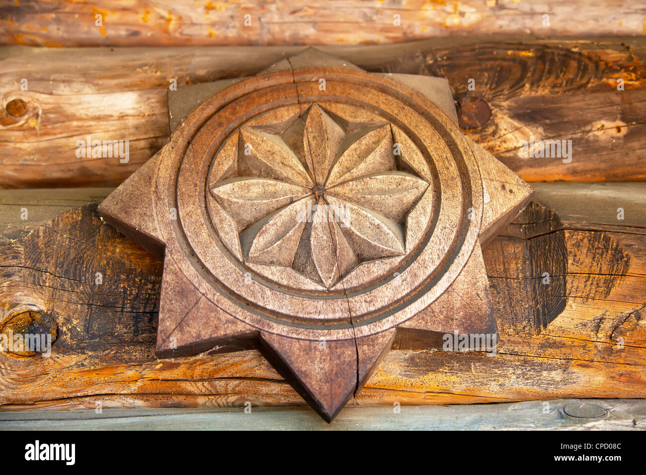 Wooden flower with circle and star Stock Photo - Alamy