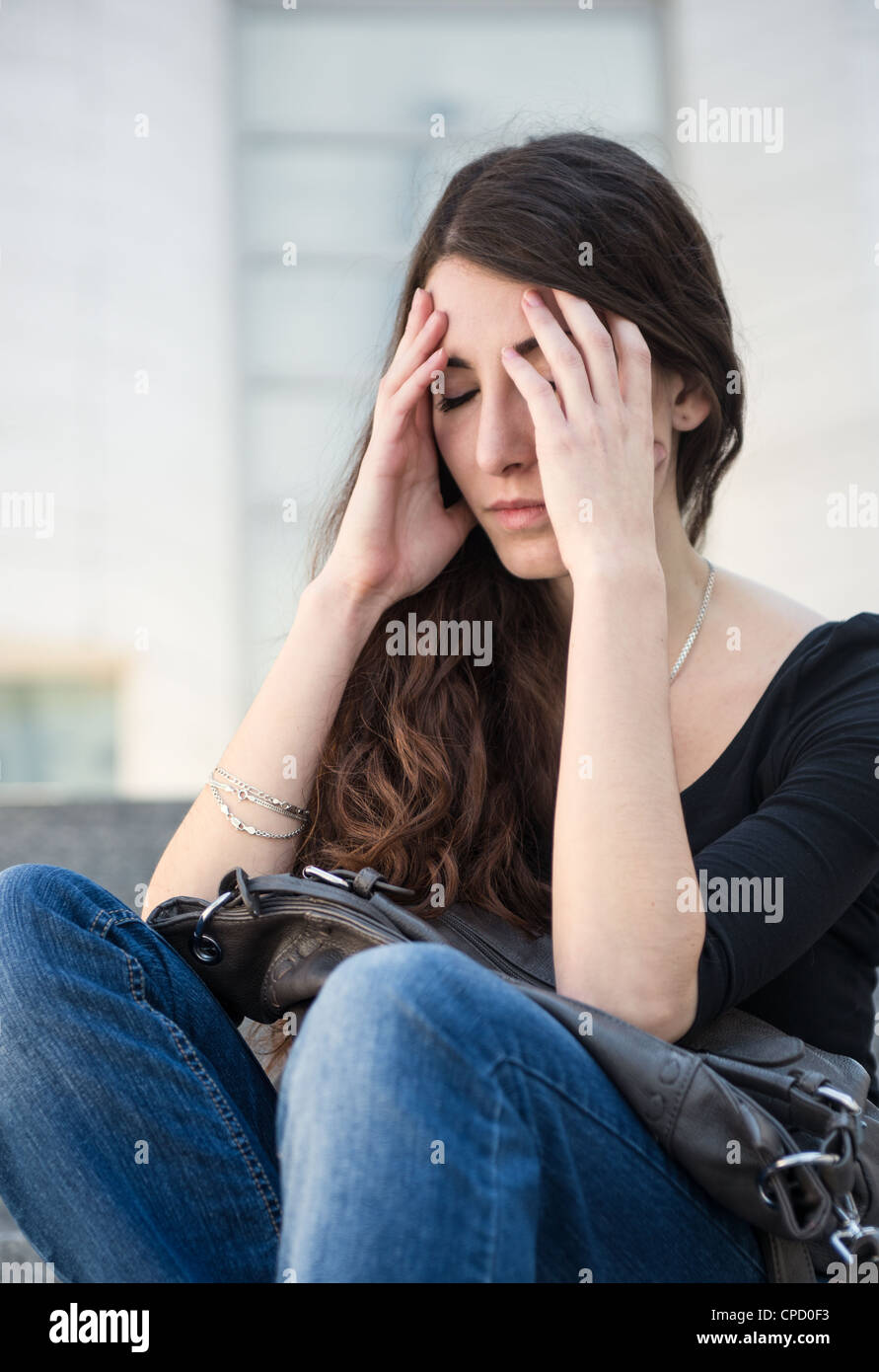 Young woman in depression - outdoor portrait, negative expression Stock ...