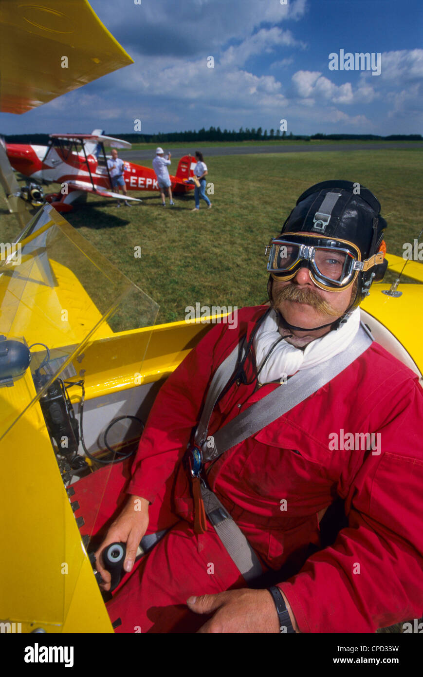 Pilot in cockpit of ultra light biplane Kiebitz, France Stock Photo - Alamy