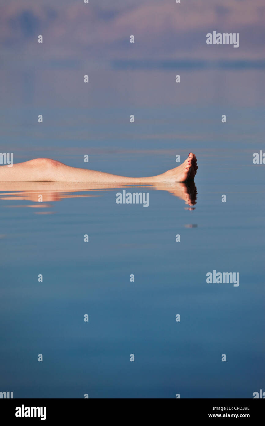 Young woman floating in the Dead Sea, Movenpick Resort Hotel, Jordan ...
