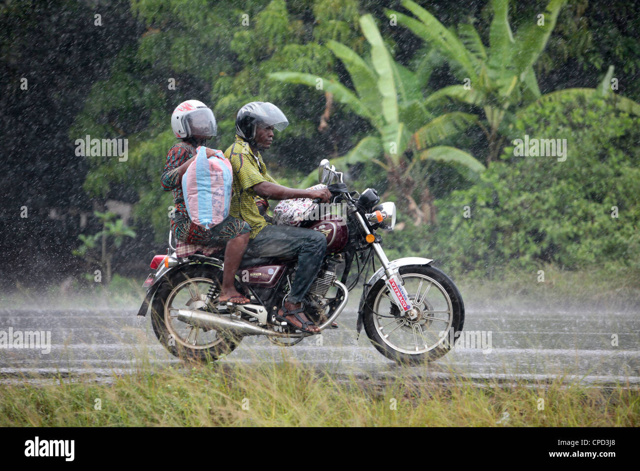 African road in the rain, Ouidah, Benin, West Africa, Africa Stock ...