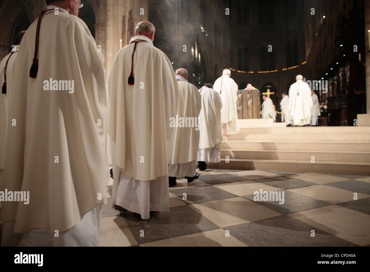 Priests' procession in Notre-Dame de Paris cathedral, Paris, France ...