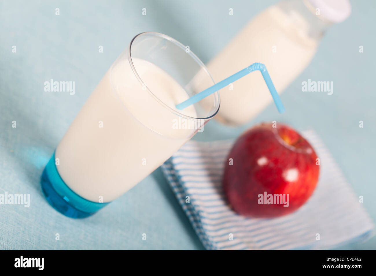 Healthy nutrition with fresh milk and red apple Stock Photo - Alamy