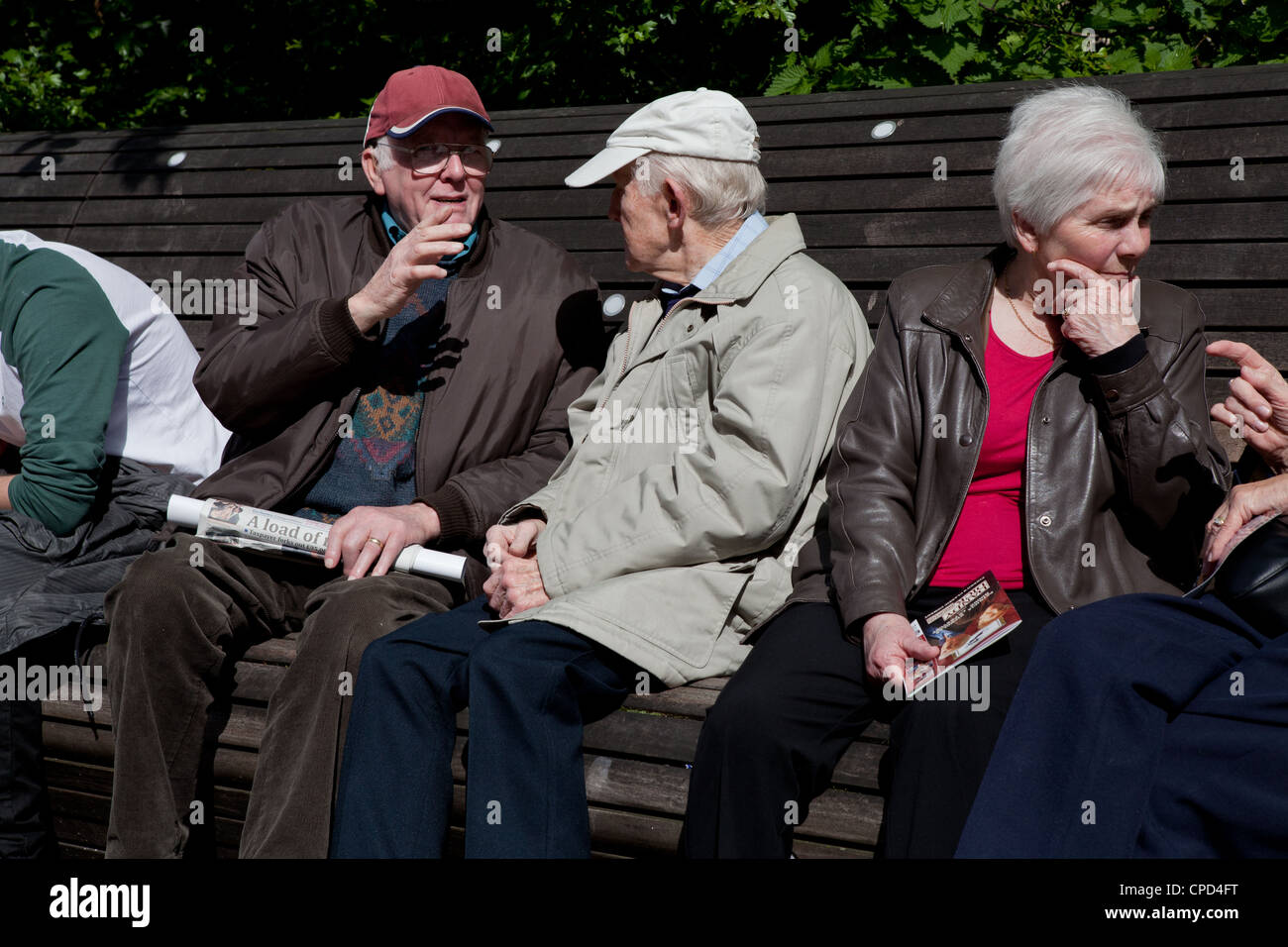 Old friends in conversation Stock Photo - Alamy