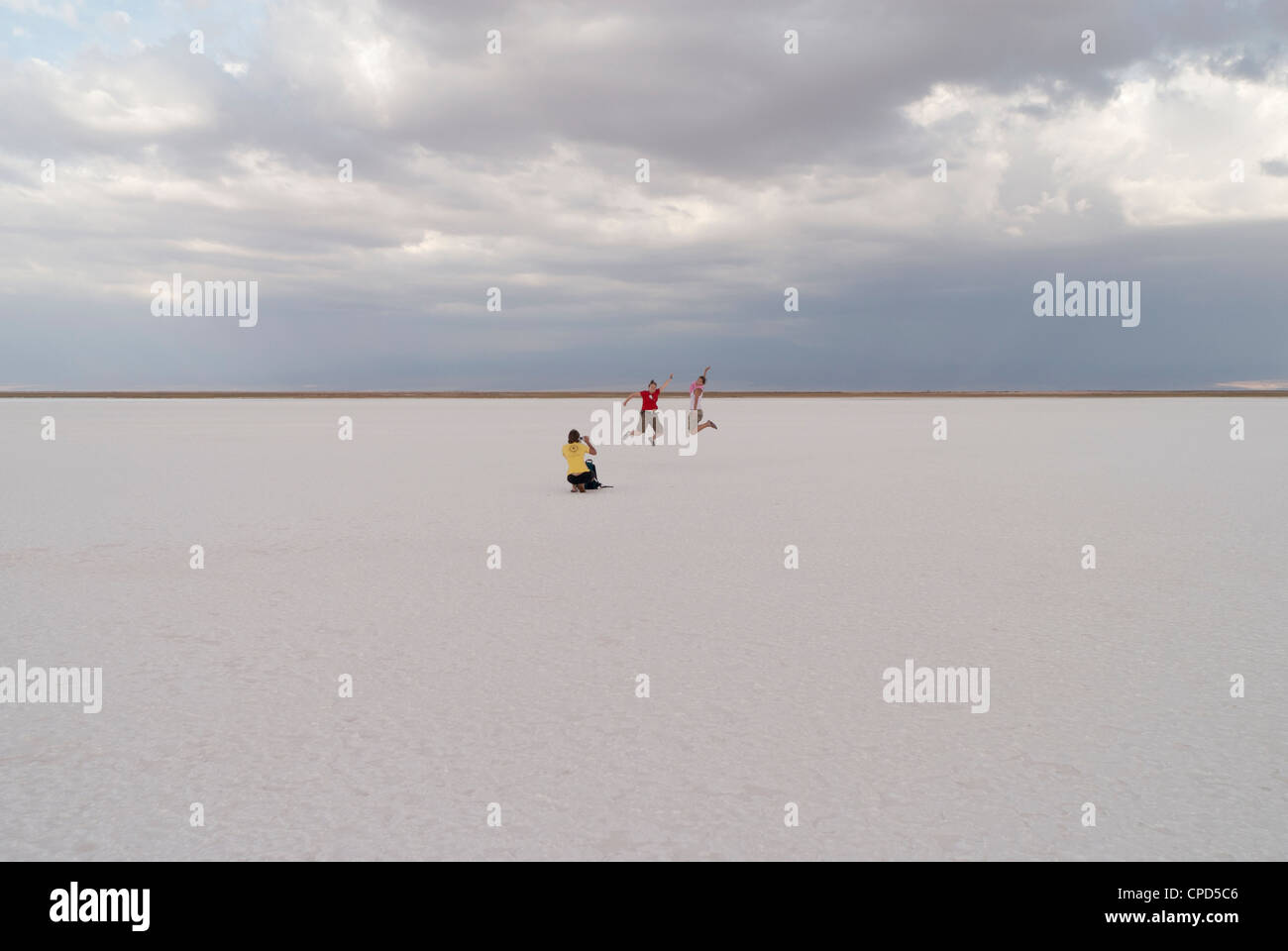 People jumping for a photo, Salt Flats, Atacama Stock Photo - Alamy