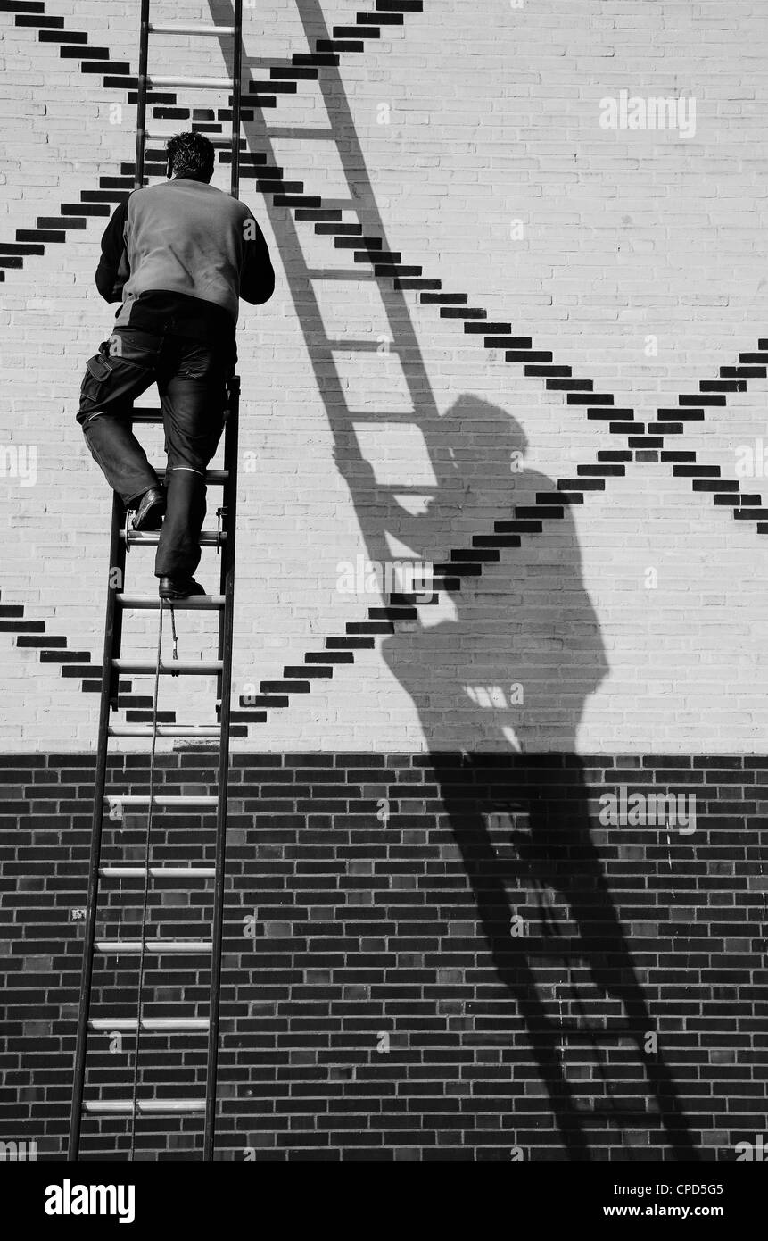 Construction worker falling ladder Black and White Stock Photos ...