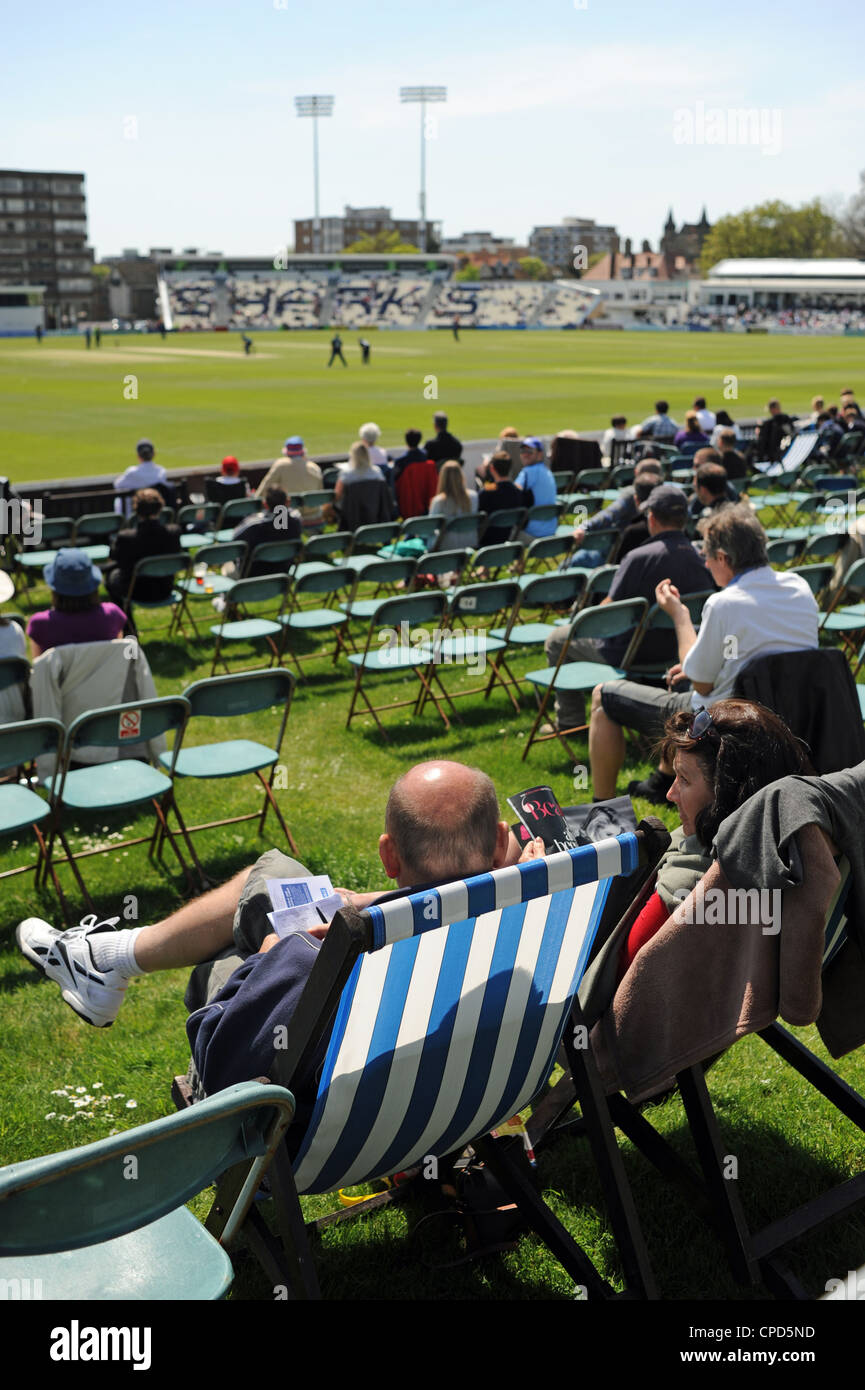 Spectators watching a cricket match at the Probiz County Ground in Hove ...