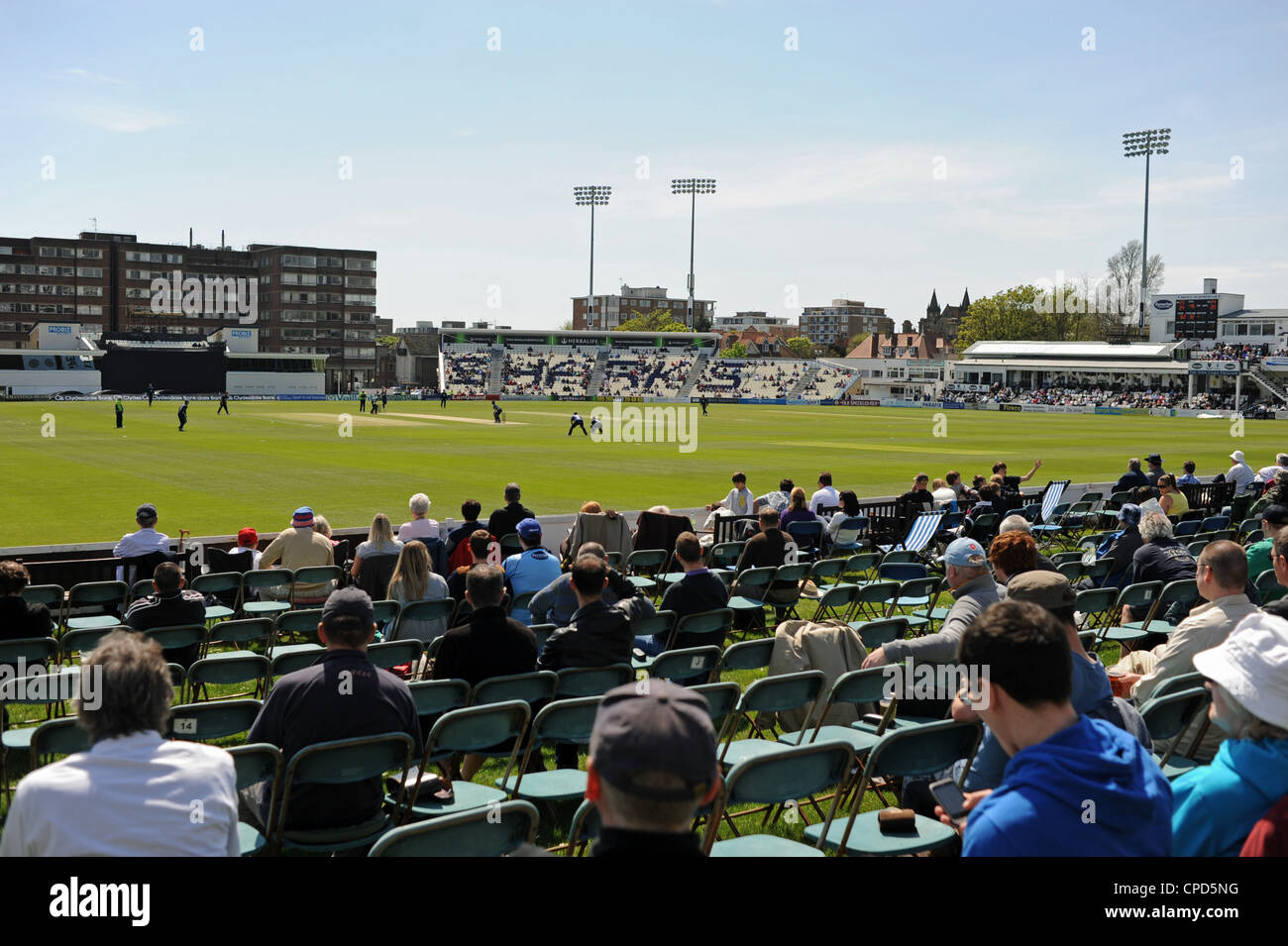 Spectators watching a cricket match at the Probiz County Ground in Hove ...