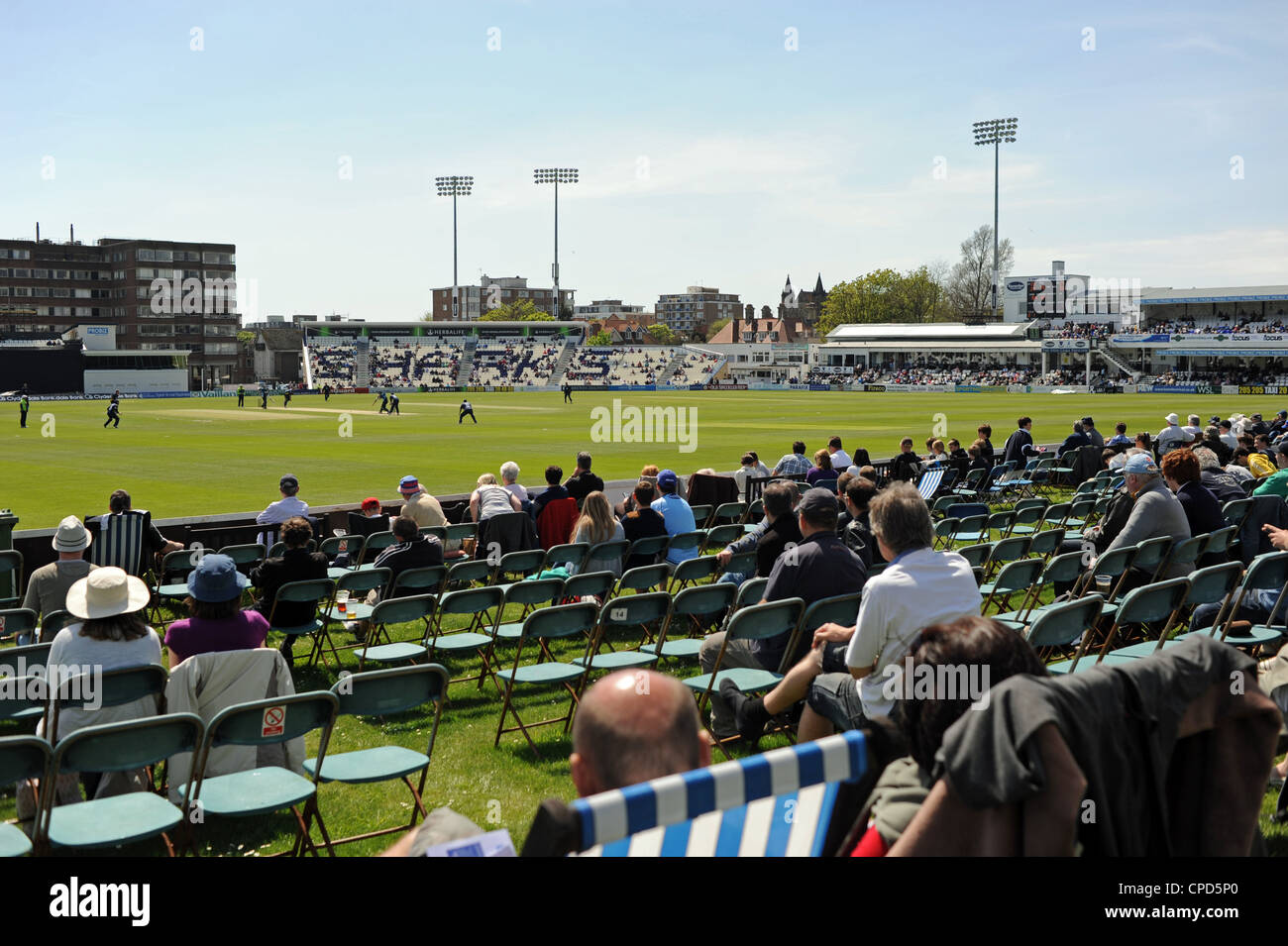Spectators watching a cricket match at the Probiz County Ground in Hove ...