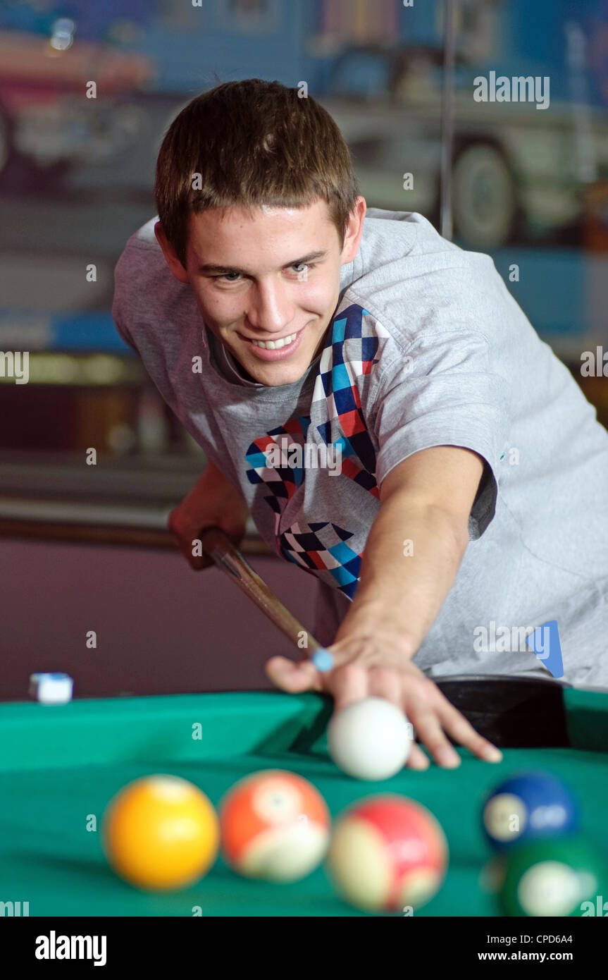 Photo of young man during snooker game Stock Photo - Alamy