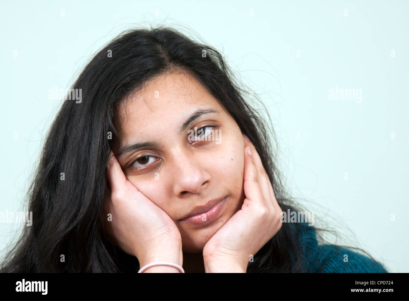 As Indian female looking confused Stock Photo - Alamy