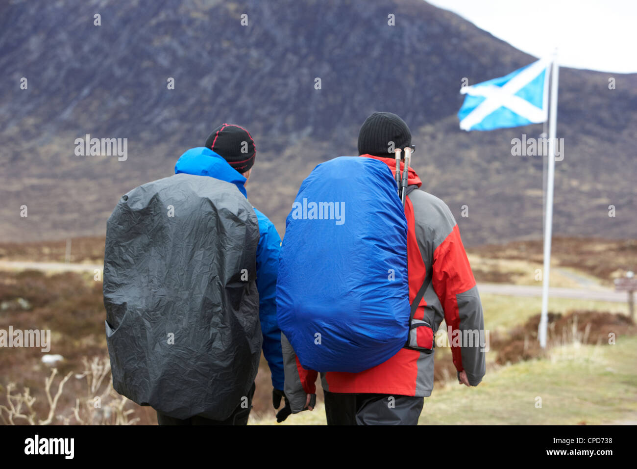 two male walkers hikers in the highlands of scotland glencoe Scotland ...