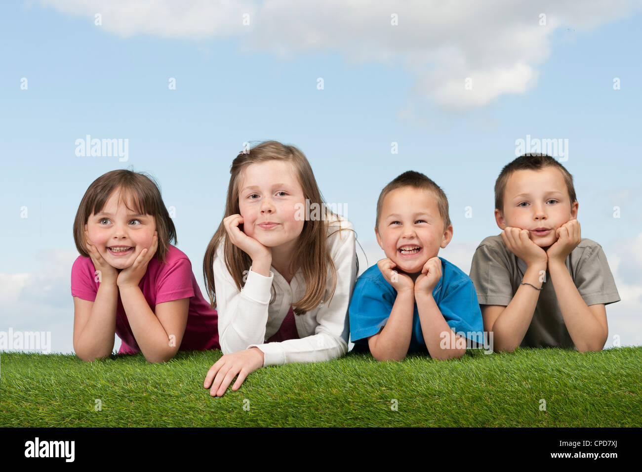 children in a row in the garden Stock Photo - Alamy