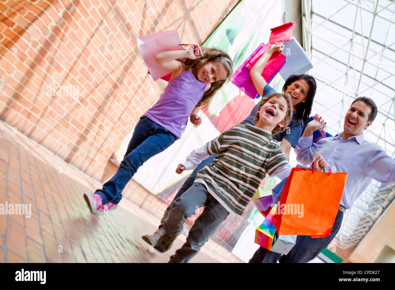 Hispanic family shopping together Stock Photo - Alamy