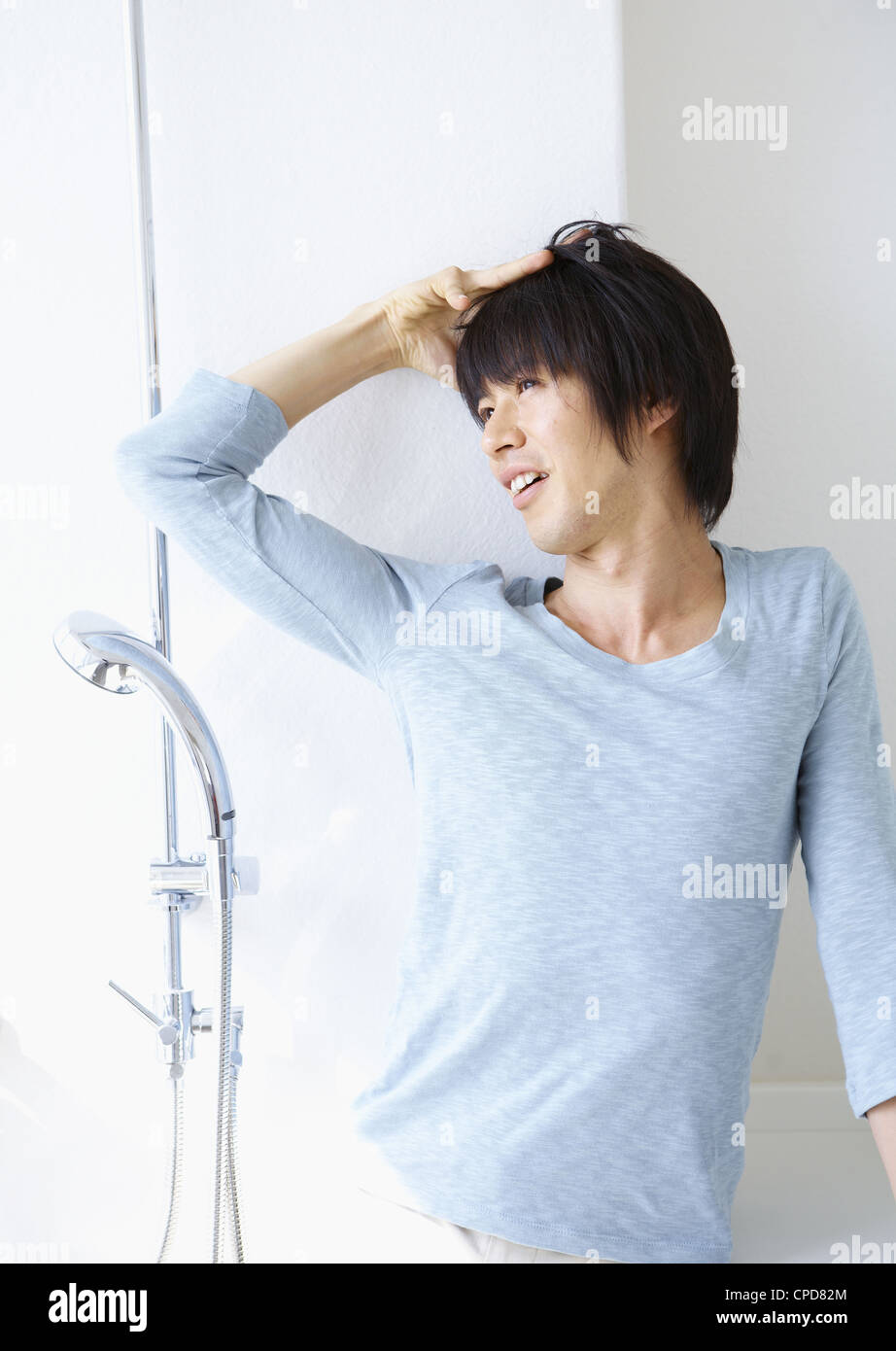 Hand On Head Pose High Resolution Stock Photography and Images - Alamy