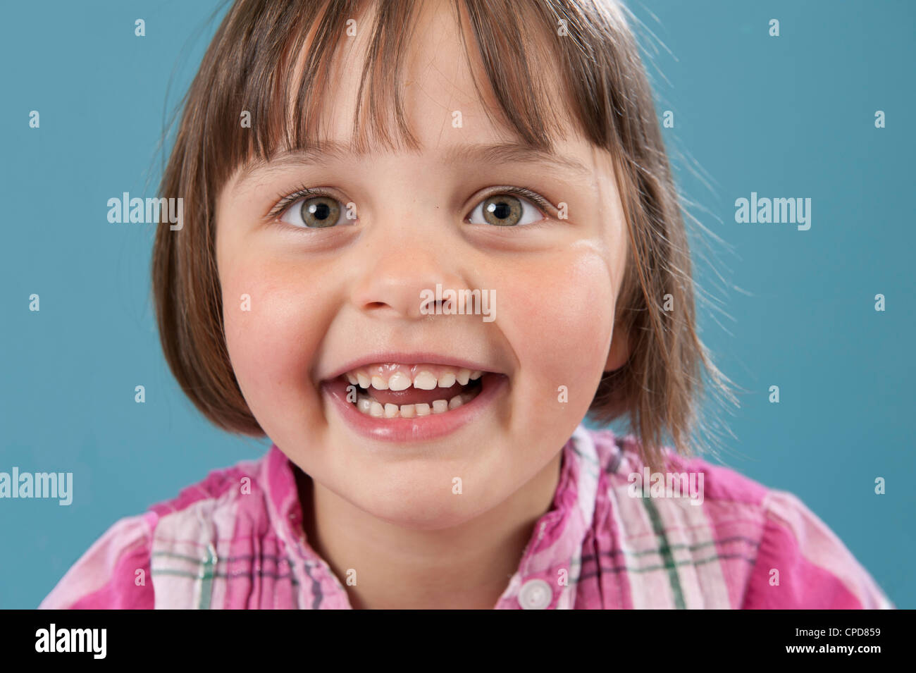 little girl with big smile Stock Photo - Alamy