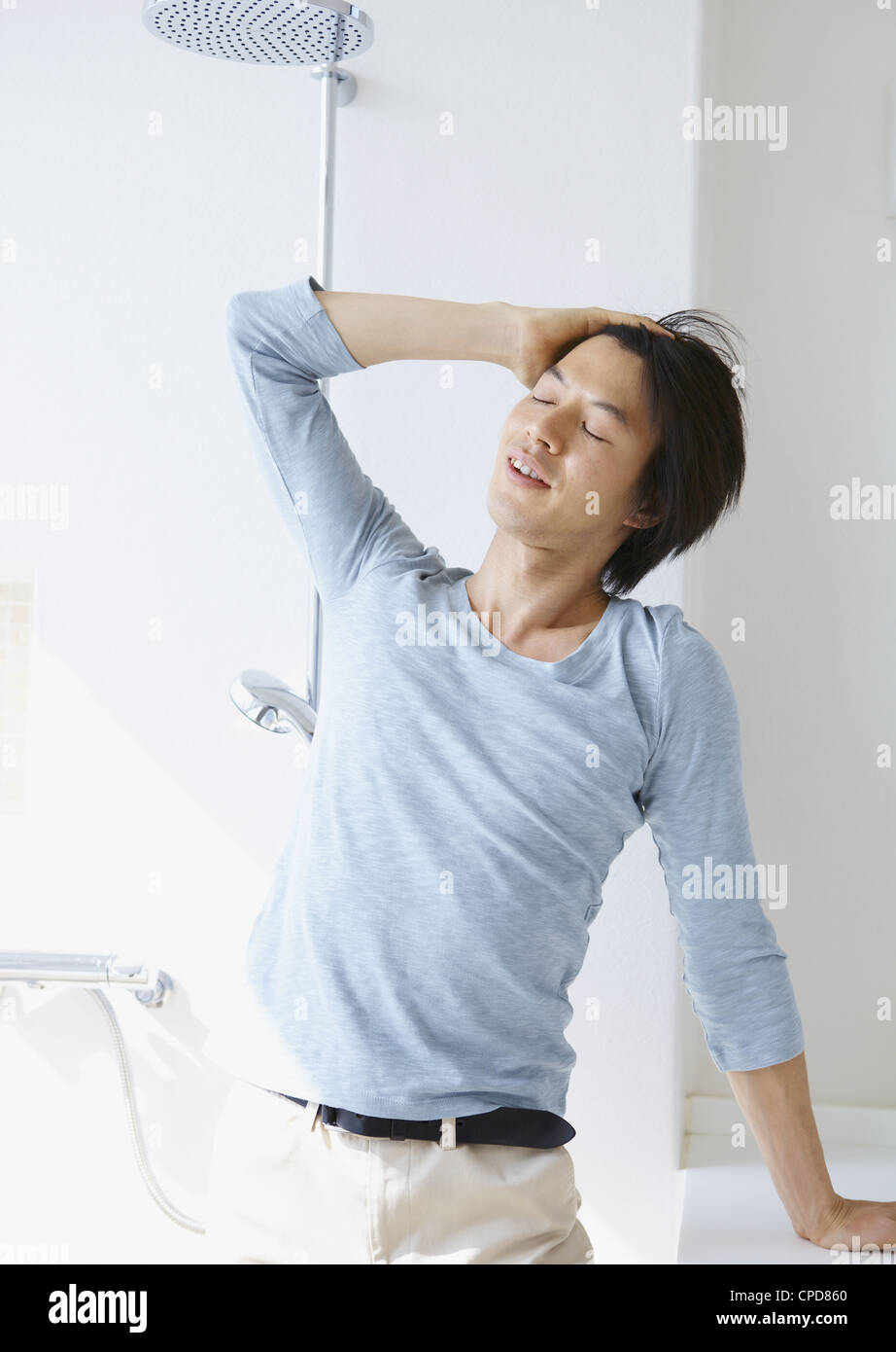 Middle-aged man hand in his hair Stock Photo - Alamy