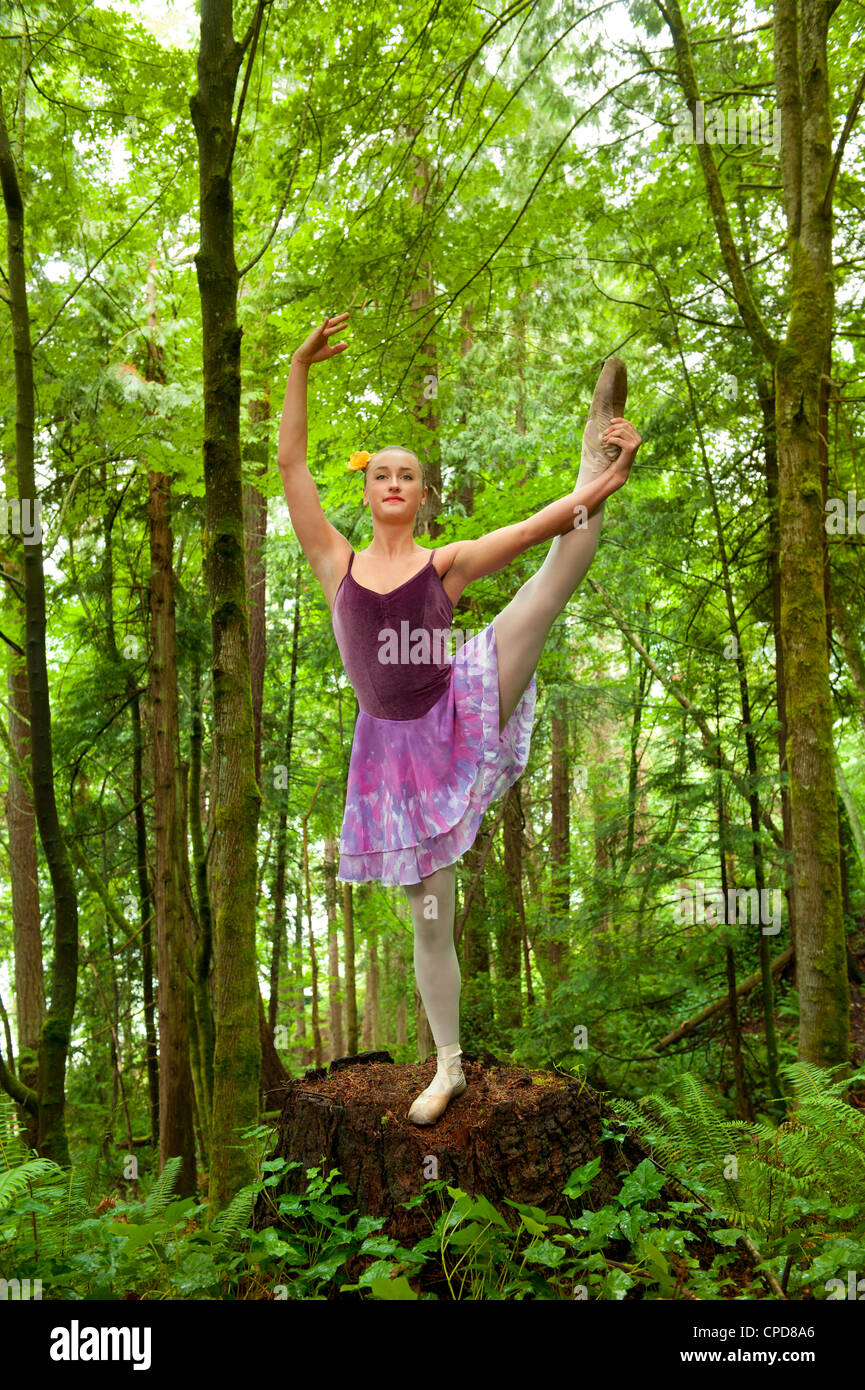Caucasian ballerina dancing in forest Stock Photo - Alamy