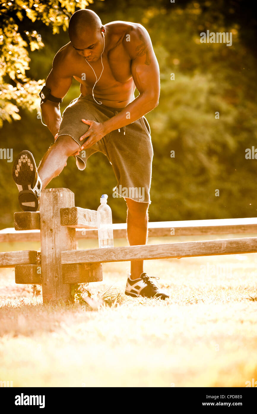 African American man stretching before exercise Stock Photo - Alamy