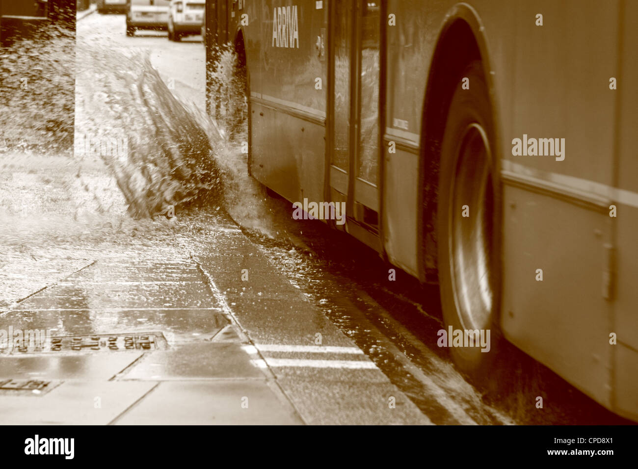 London bus puddle hi-res stock photography and images - Alamy