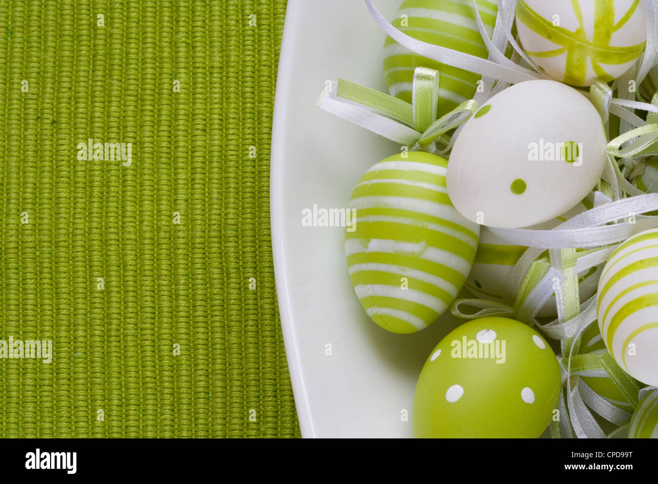 Easter eggs stripes on green hi-res stock photography and images - Alamy